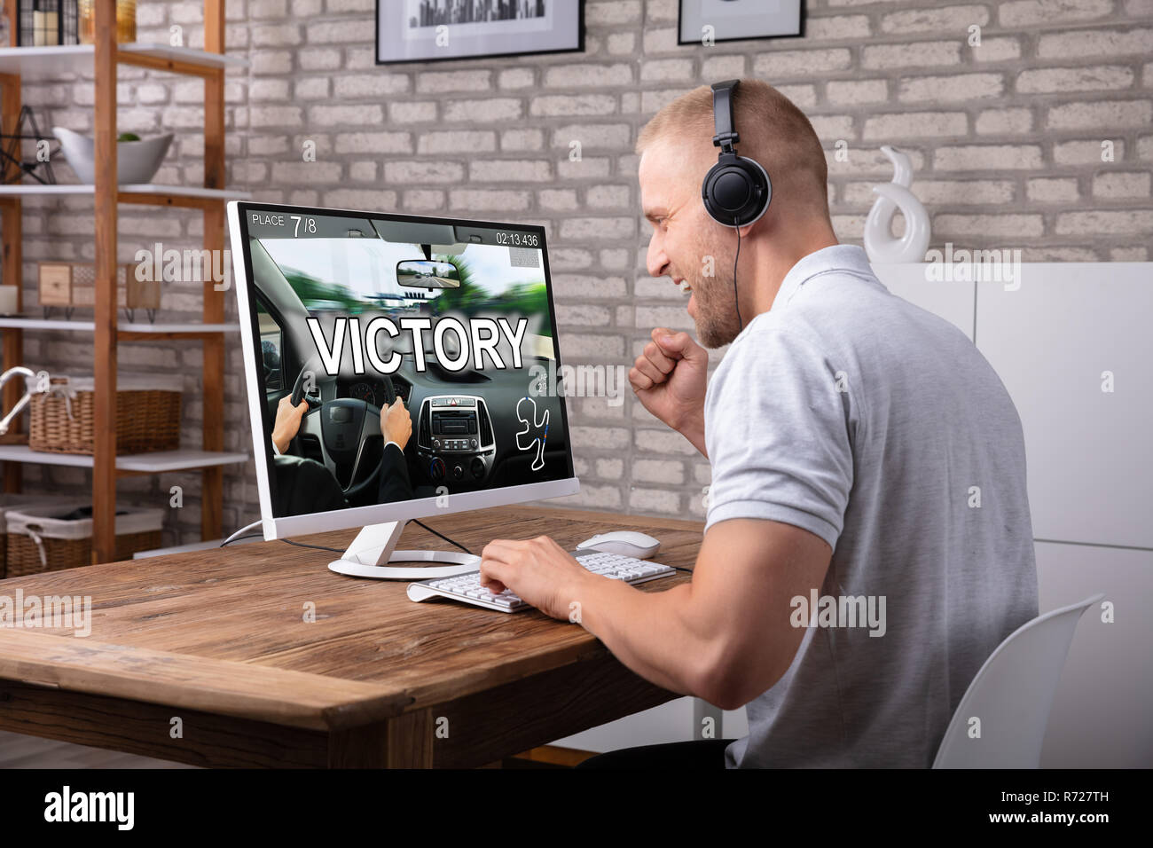 Man computer headset home hi-res stock photography and images - Alamy