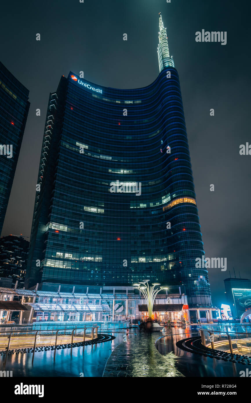 The UniCredit Tower at night, at Piazza Gae Aulenti, in Milan, Italy ...