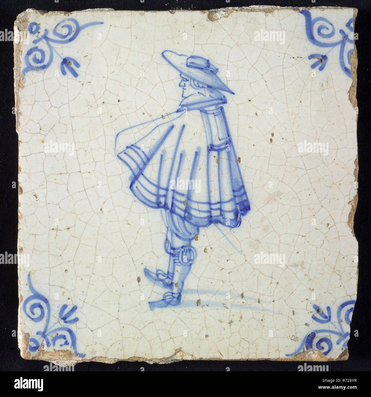 Figure tile, blue with nobleman with wide cape and big hat, corner ...