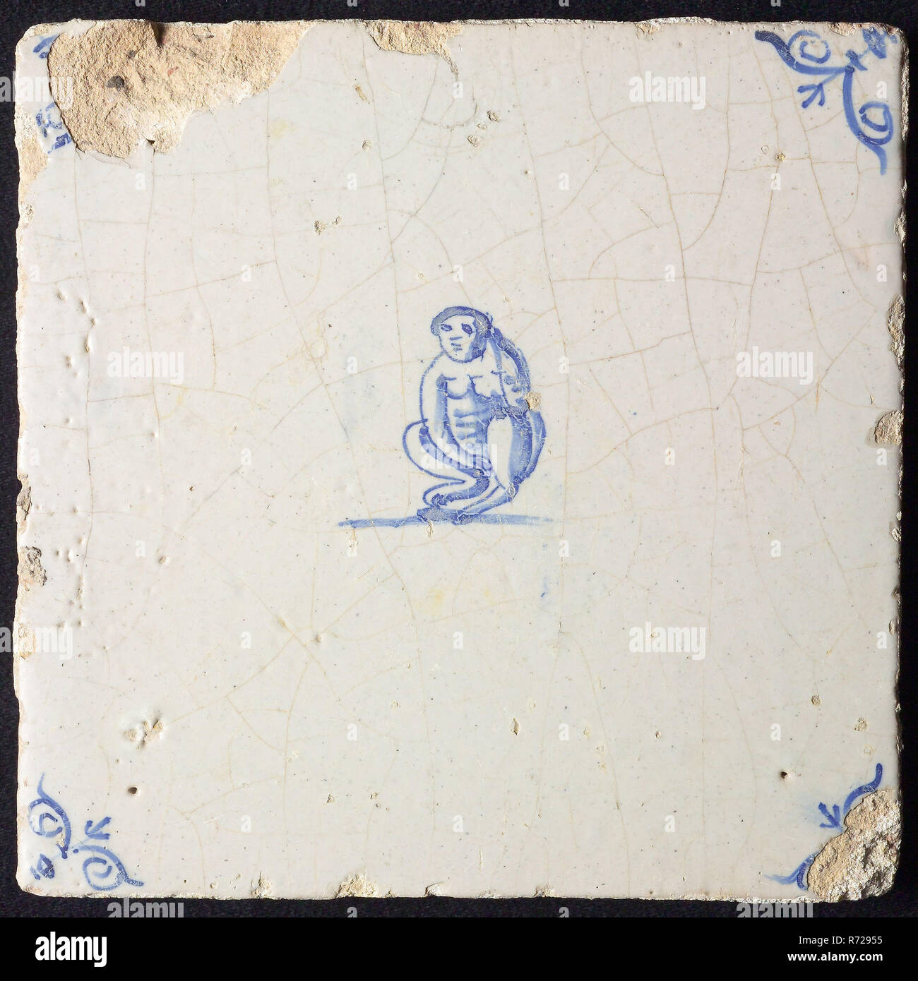 Animal tile, sitting monkey to the left, in blue on white, corner ...