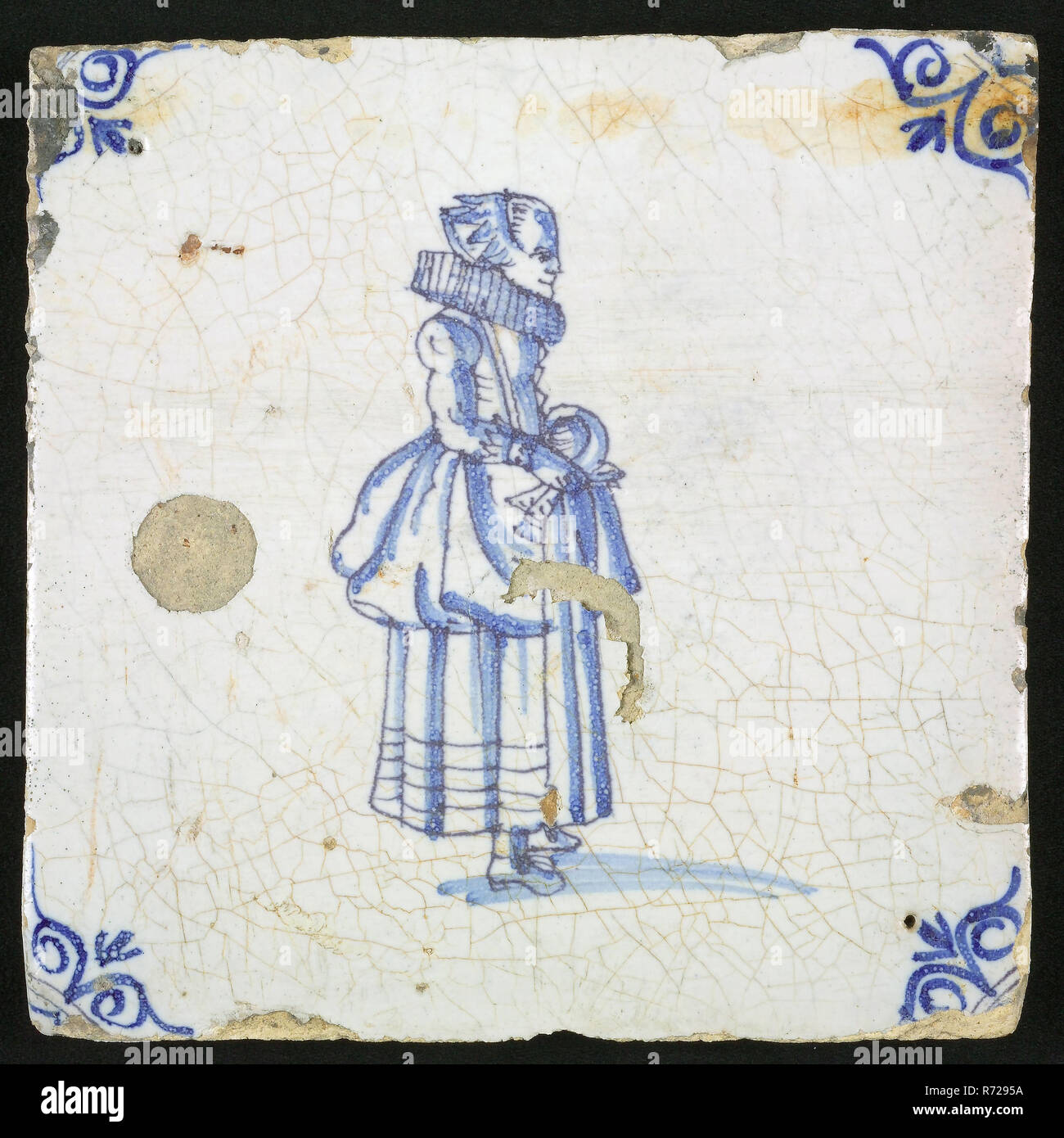 Figure tile, blue with lady with millstone collar and drawn overcoat ...