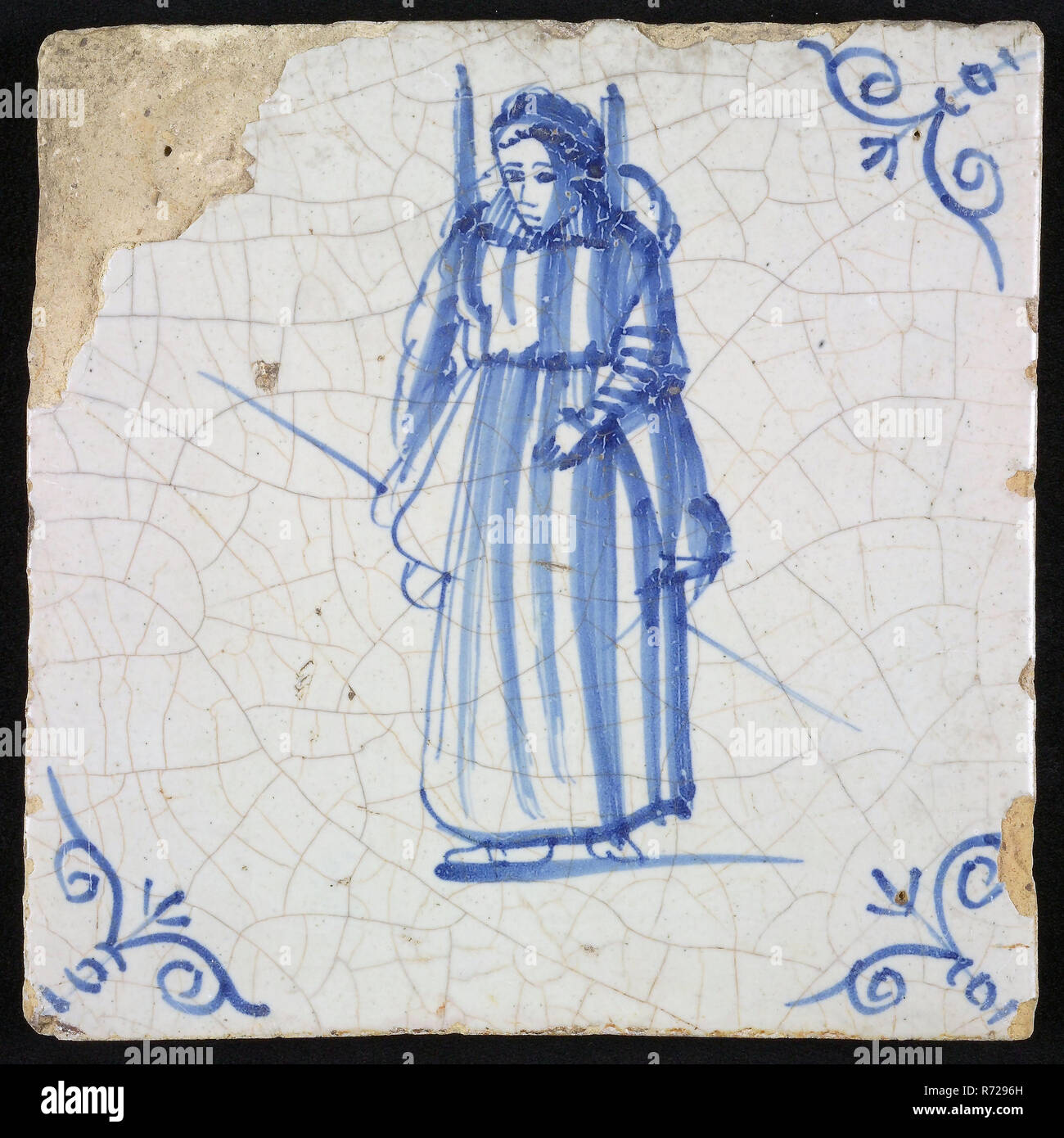 Figure tile, blue with lady with carrying frame on the back and staff ...