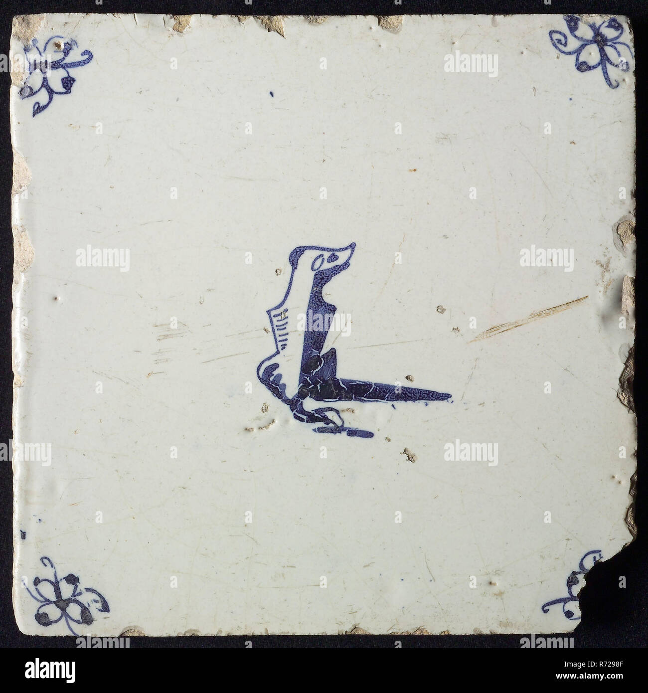 Animal tile, sitting unknown animal seen from the back, to the right ...