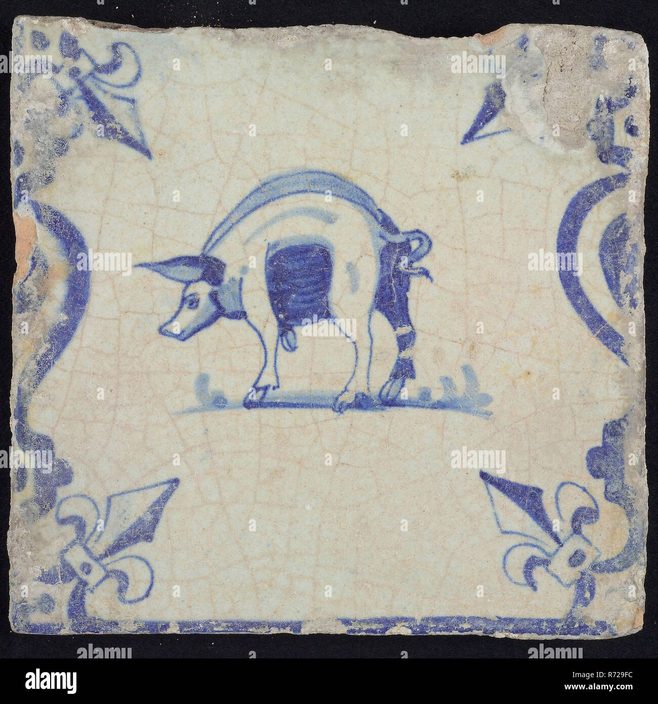 Animal tile, standing pig to the left on plot between balusters, in ...