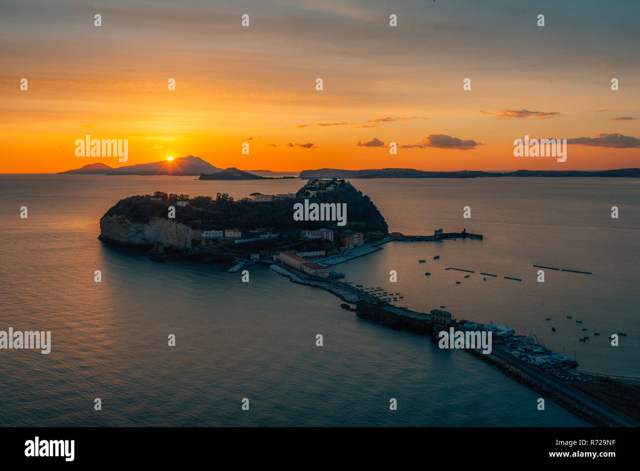 A view of the Islet Of Nisida at sunset, from Parco Virgiliano, in ...