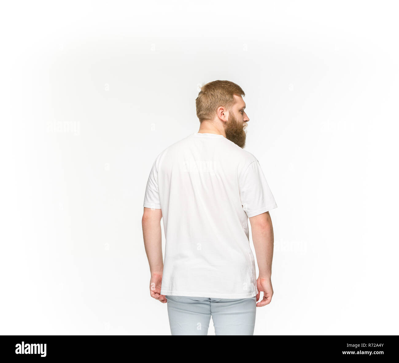 Closeup of young man's body in empty white t-shirt isolated on white ...