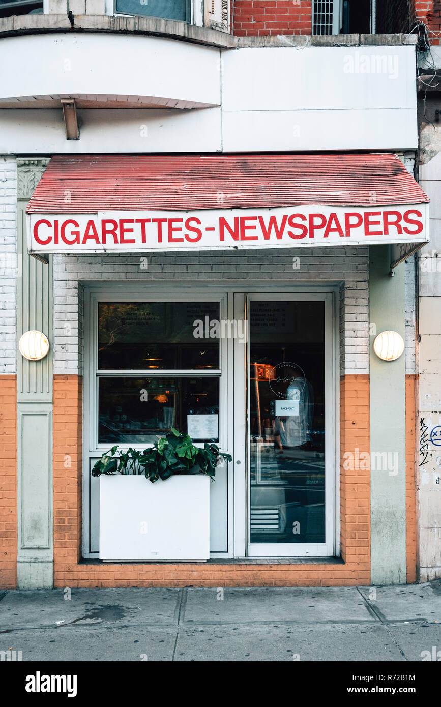 Cigarettes and Newspapers sign in the Lower East Side, Manhattan, New ...