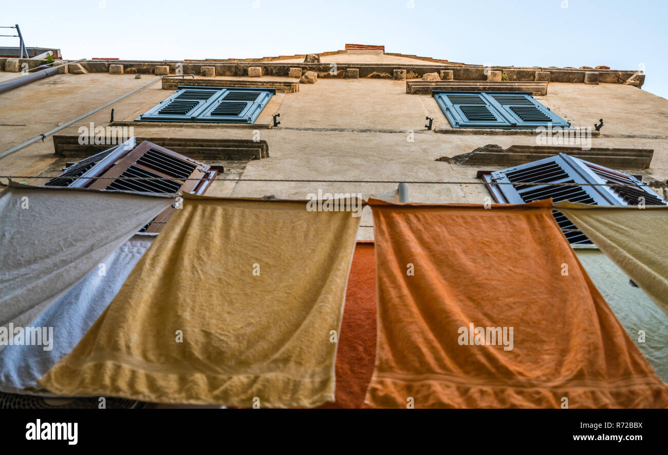 Laundry drying on a clothesline Stock Photo - Alamy