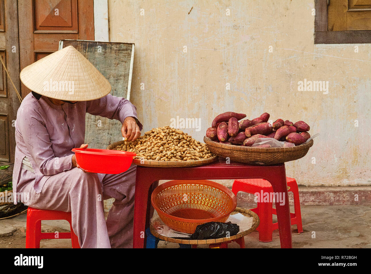 market of peanuts and sweet potatoes around the market in Hoi An ...