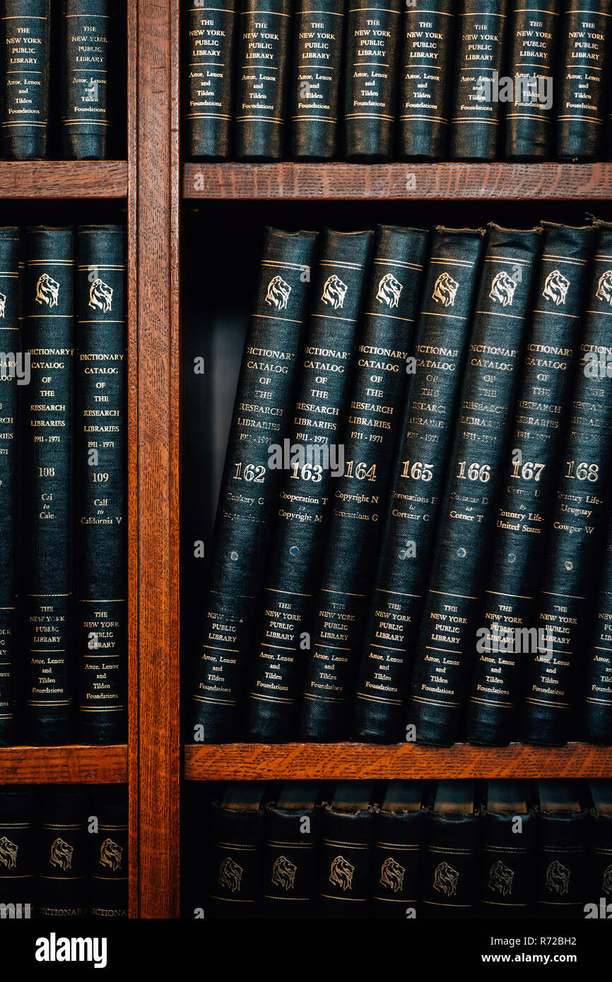 Books on a shelf at the New York Public Library in Midtown Manhattan ...
