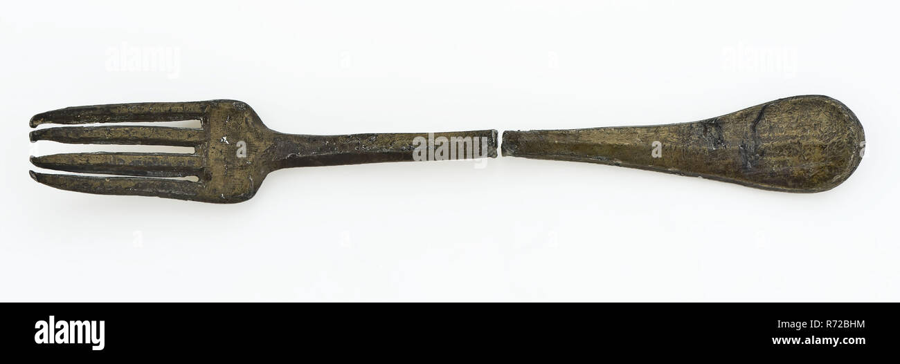 Small fork with four teeth, broken into two parts, fork cutlery soil ...