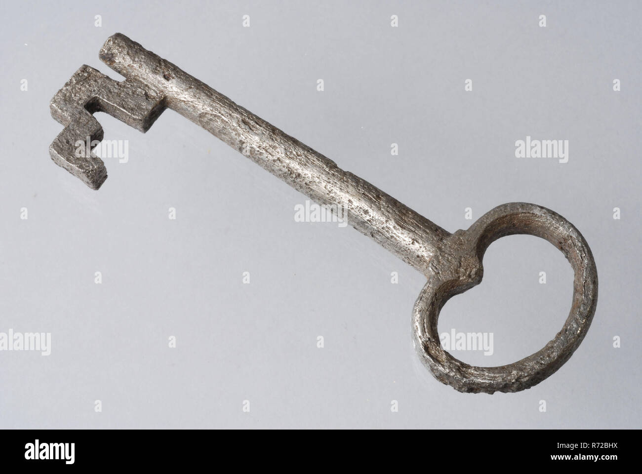 Key with oval handle and beard, key iron commodity founding iron metal ...