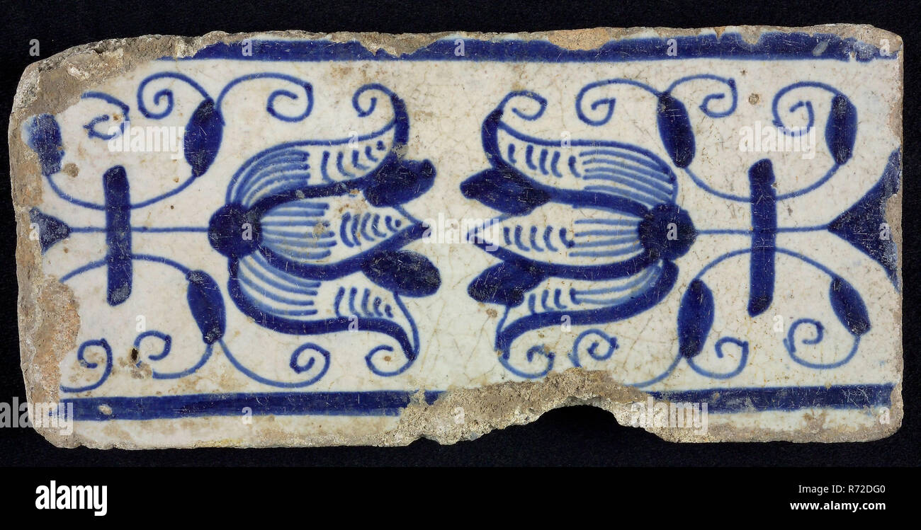 Blue border tile, waving floral pattern with tulips, above and below ...