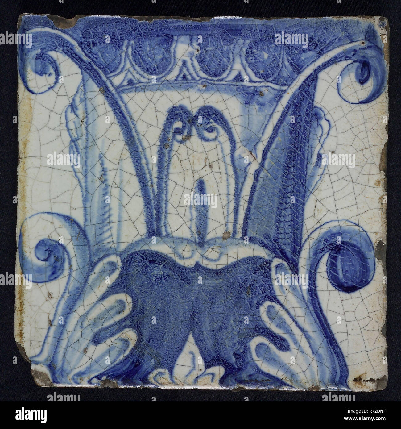 Blue tile of an upper part of corinthian column with volutes, upper ...