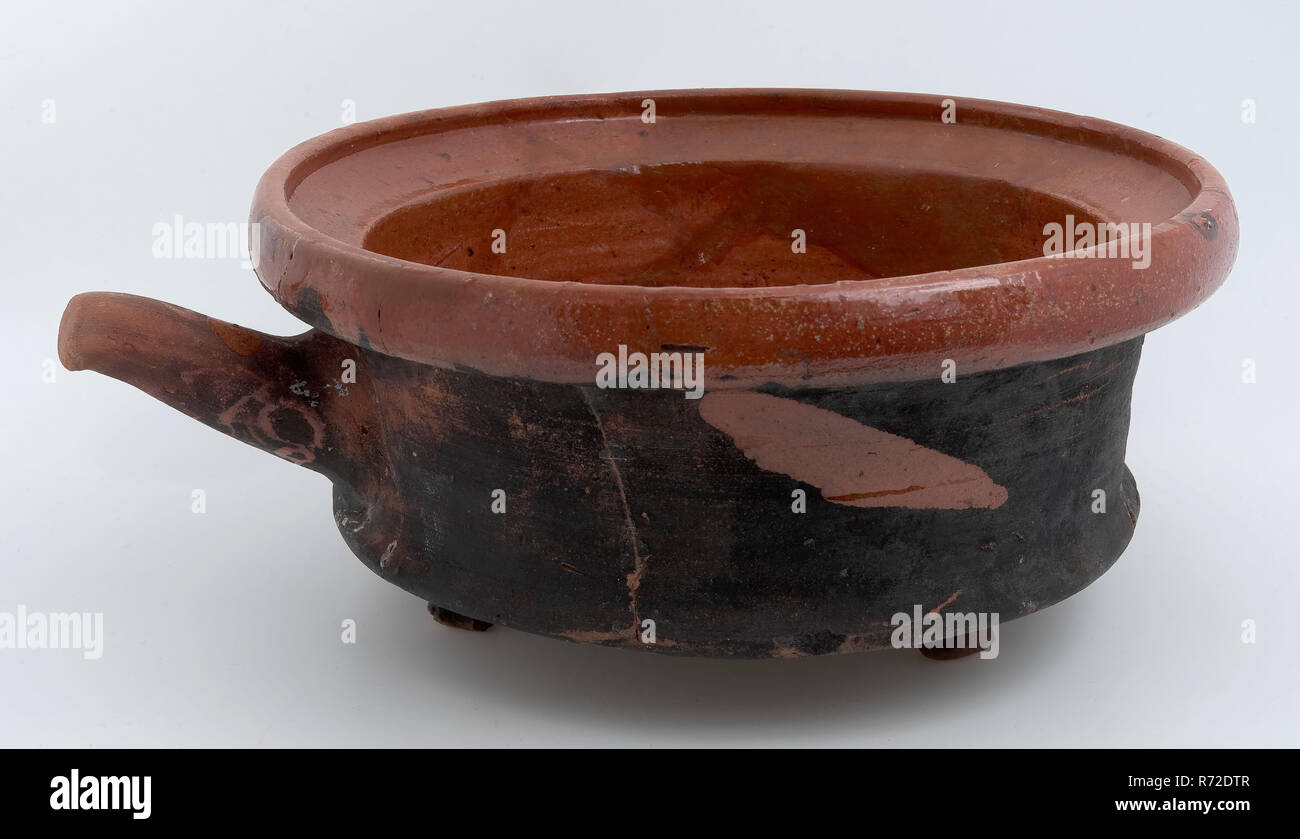 Pottery saucepan, cooking pot, red shard, internally glazed, stem, on ...