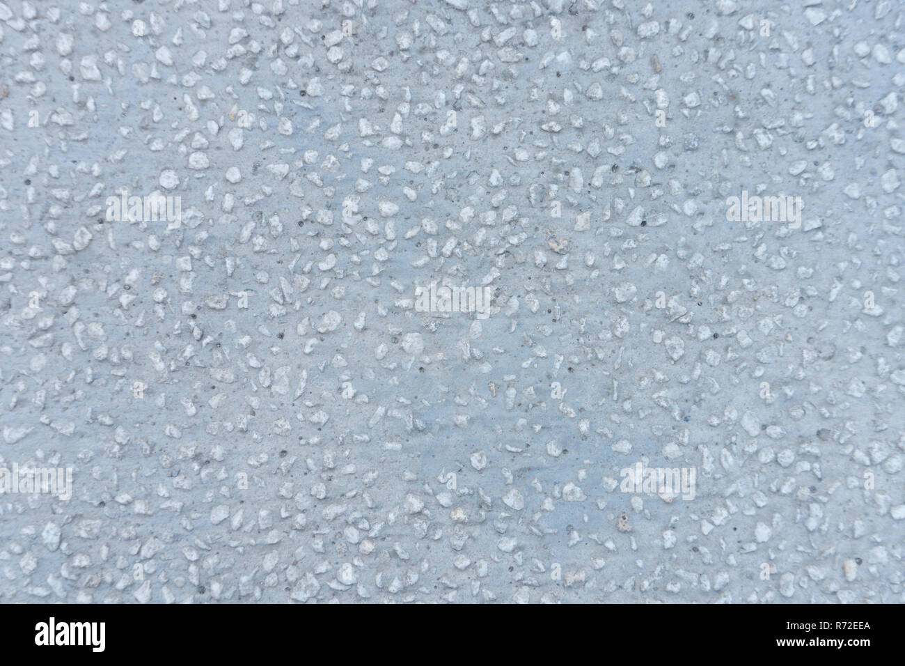 Grey cement with little stones background Stock Photo - Alamy