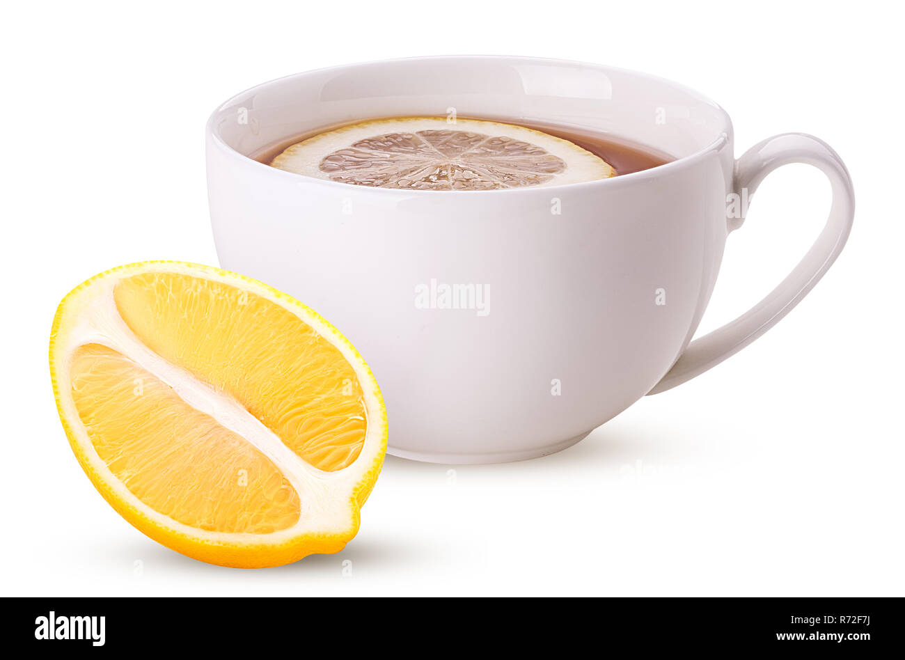 Hot black tea with lemon cut in half and slice isolated on white ...