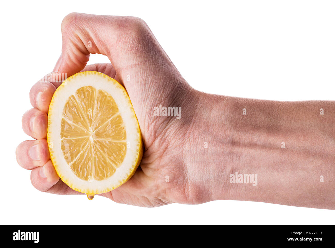 Hand squeezing half of lemon isolated on white background. Clipping ...