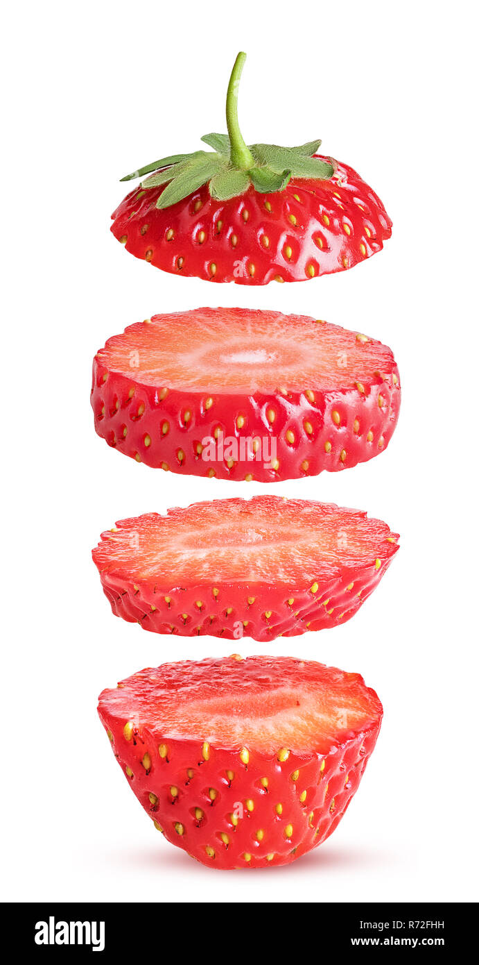 Strawberry slices flying in the air isolated on white background ...