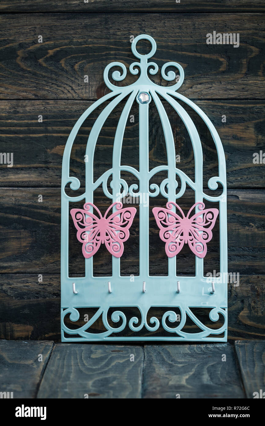 Colorful Wooden Key Hangers with Bird cage Shape Stock Photo - Alamy
