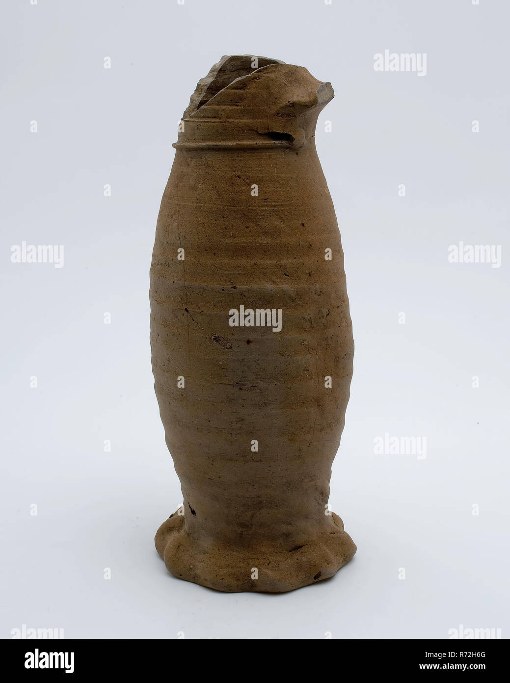 Stoneware jug placed on squeeze foot, Jug or jacobakan, Jug or ...