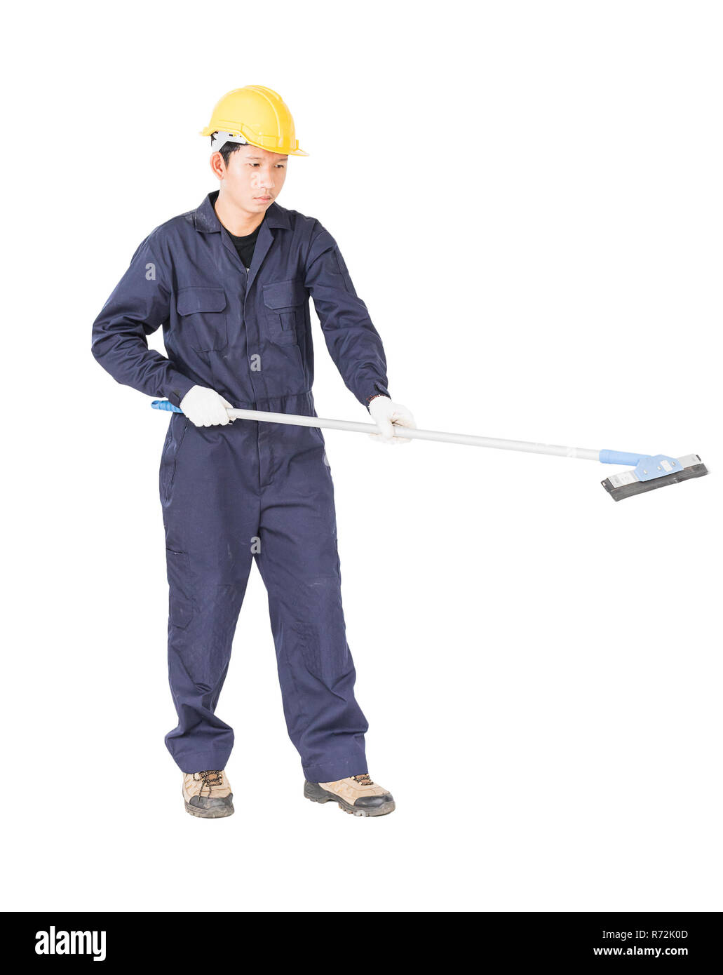 Young man hold squeegee window cleaner isolated on white Stock Photo ...