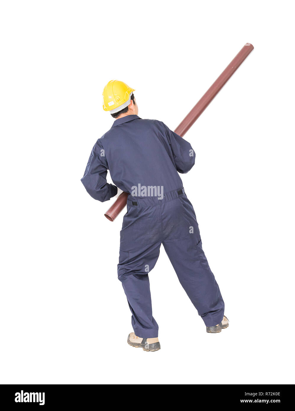 Young plumber holding pvc pipe Stock Photo - Alamy