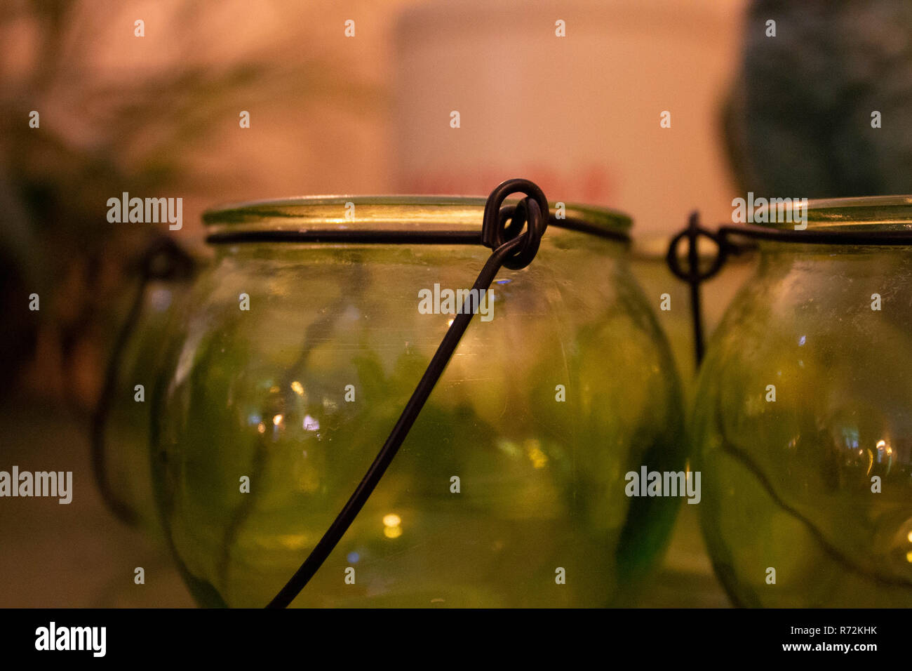 glass container with metal hook Stock Photo - Alamy