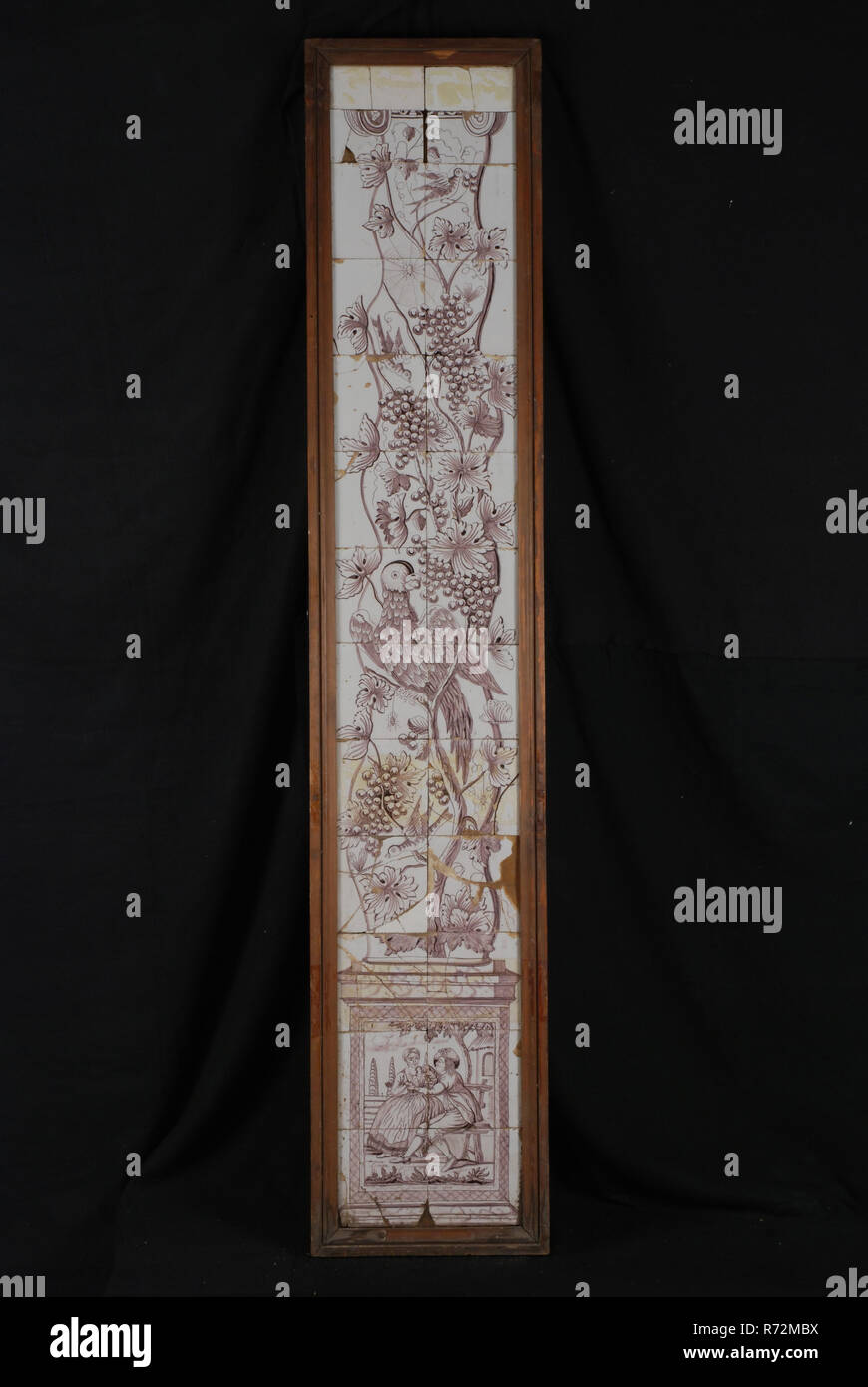 Purple tile pilaster, twisted column surrounded with vine on which ...