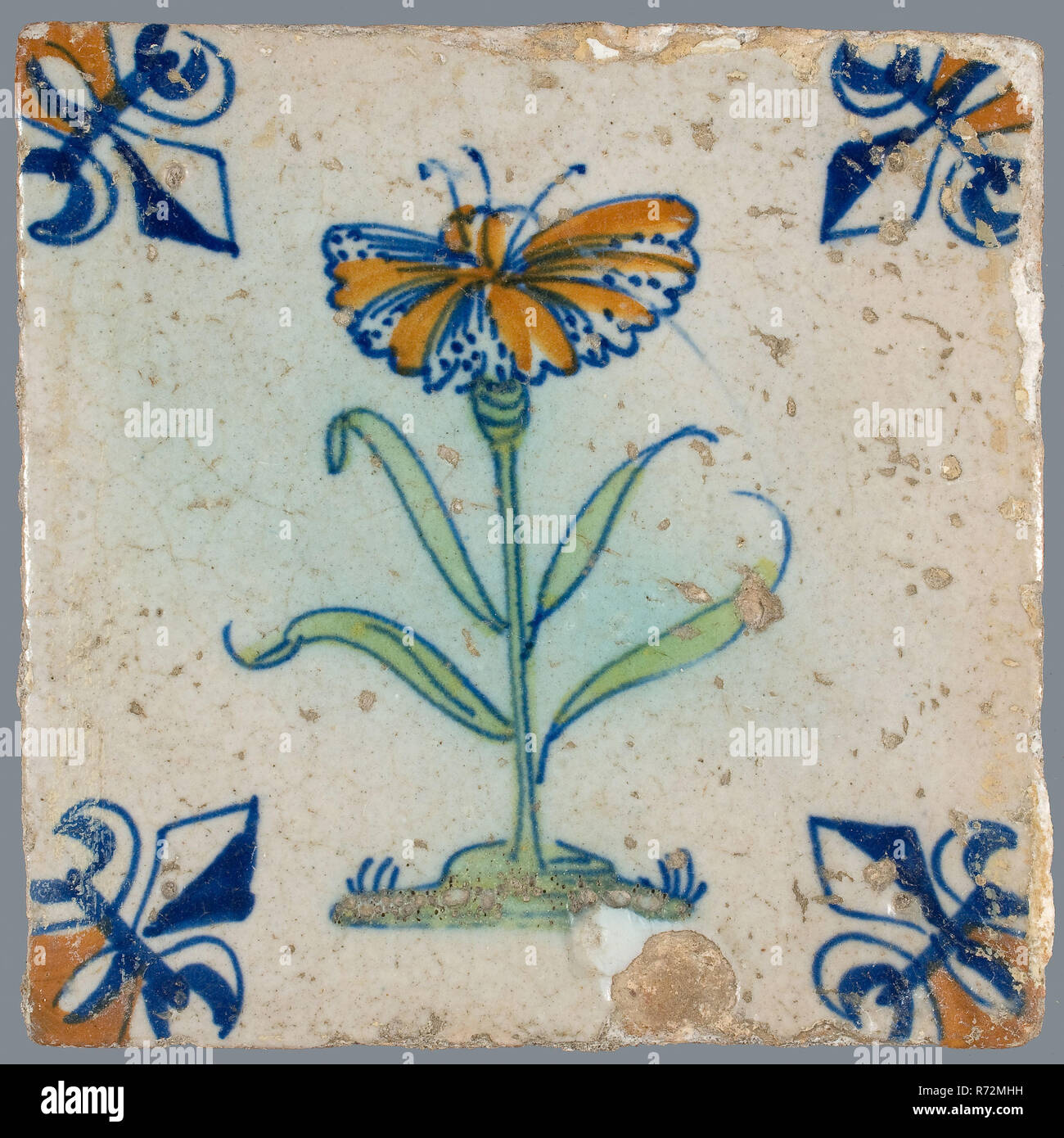 Flower Tile, flower on ground in orange, green and blue on white ...