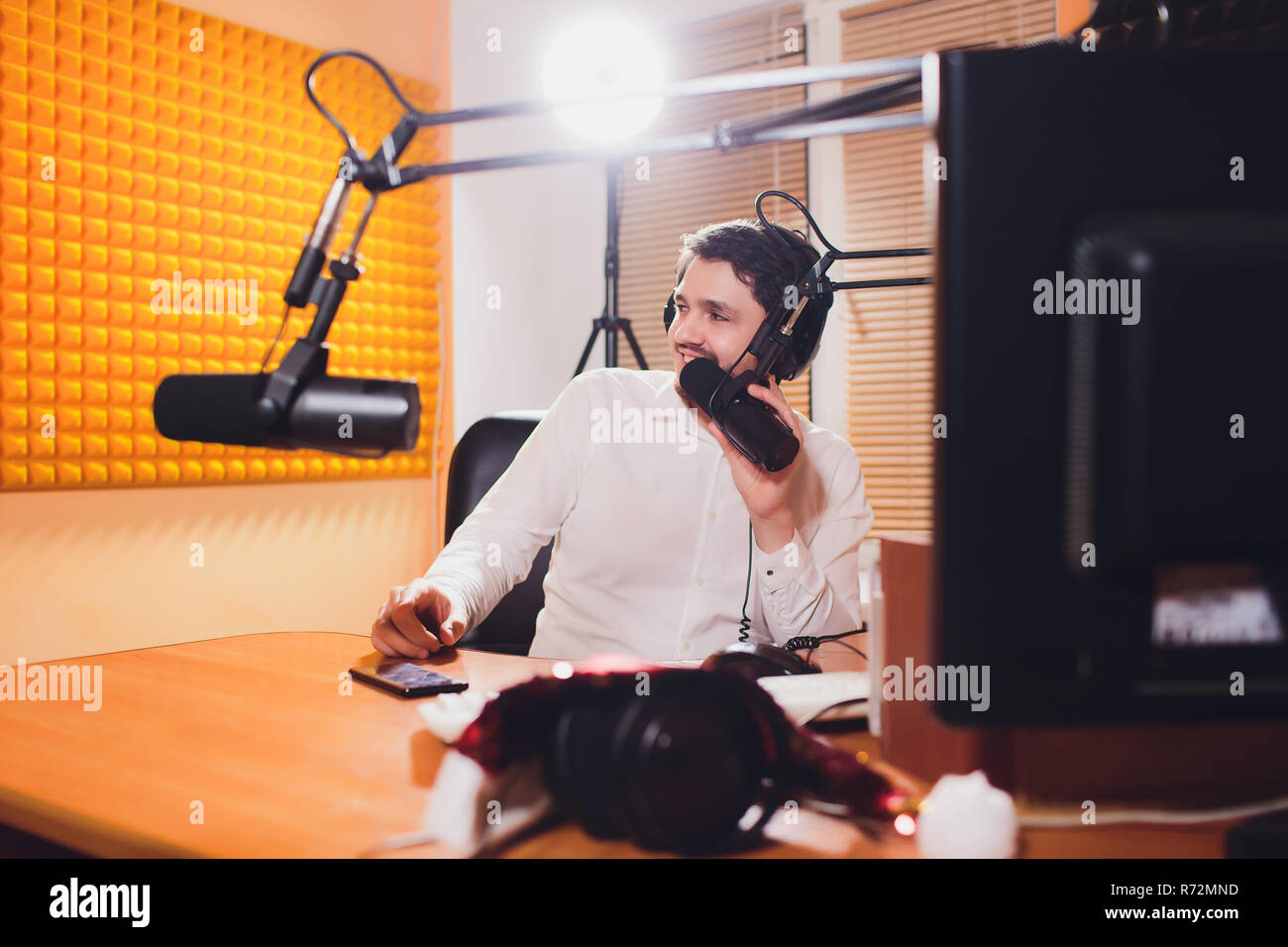 Radio host using sound mixer hi-res stock photography and images - Alamy