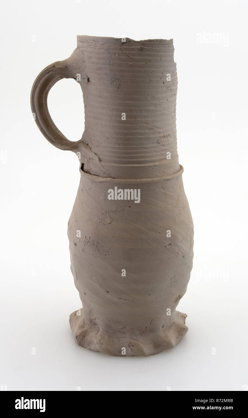 Stoneware jug, ball model with wide band ear, on squeeze foot, jug ...