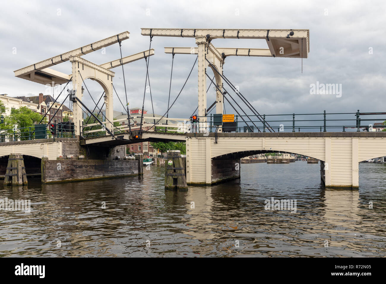View at Magere Brug, famous Dutch bridge in Amsterdam Canals Stock ...