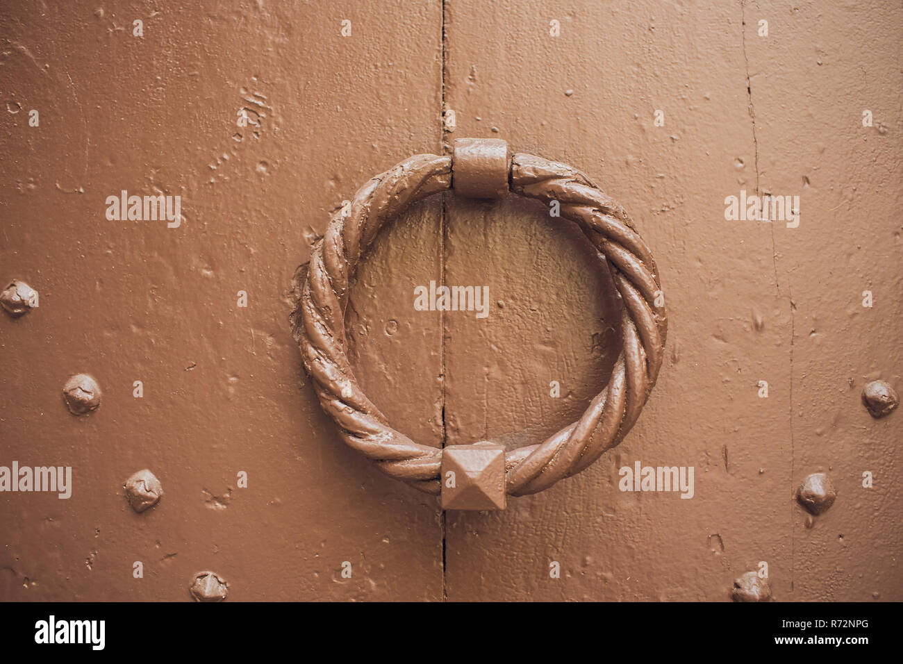 Door handles with an old double door. Golden Handle Door Entrance ...