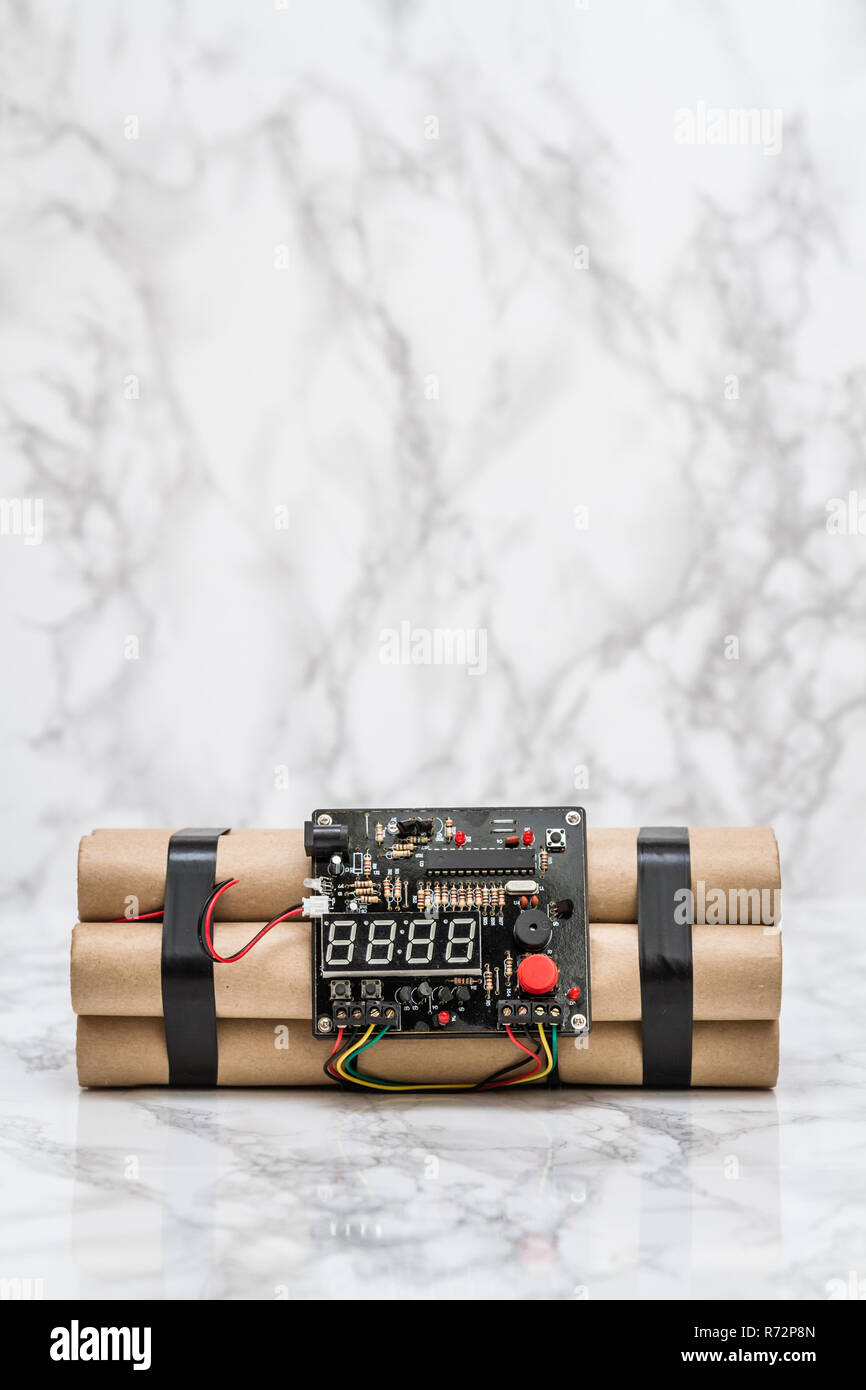 Digital Desk Clock with TNT Time Bomb Shape on White Marble Stock Photo ...