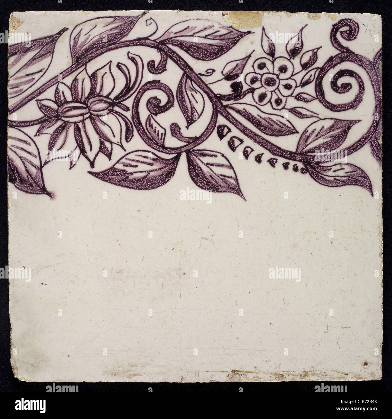 Border tile in purple with sling decoration of two flowers, leaves ...