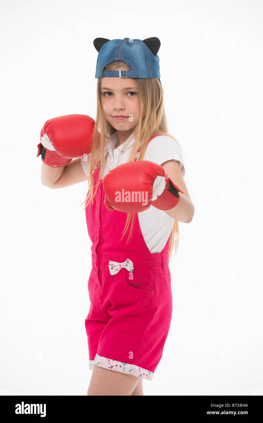 Child in boxing gloves isolated on white. Little girl before training ...
