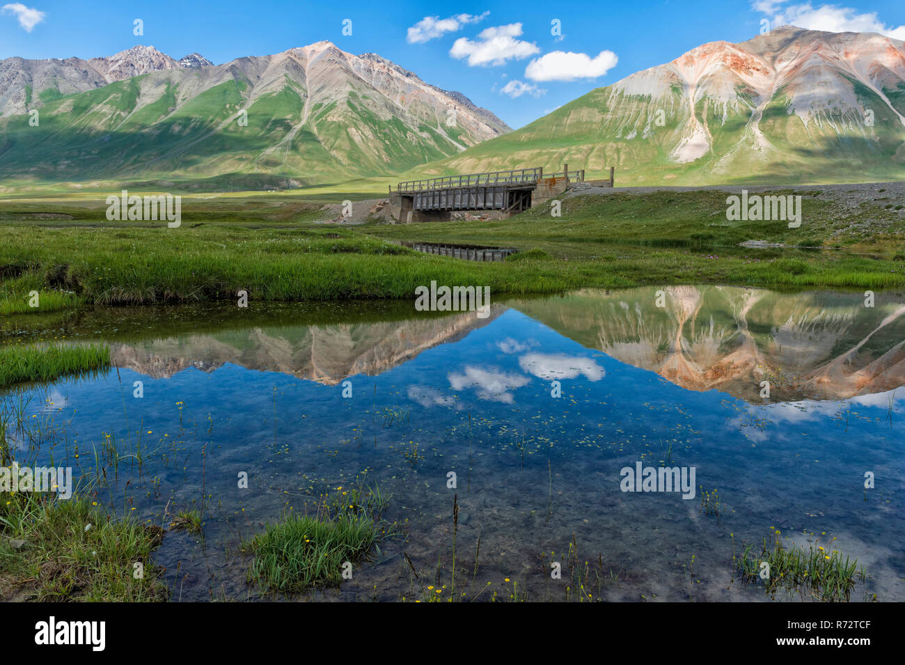 Mountains reflecting in water, Naryn gorge, Naryn Region, Kyrgyzstan ...