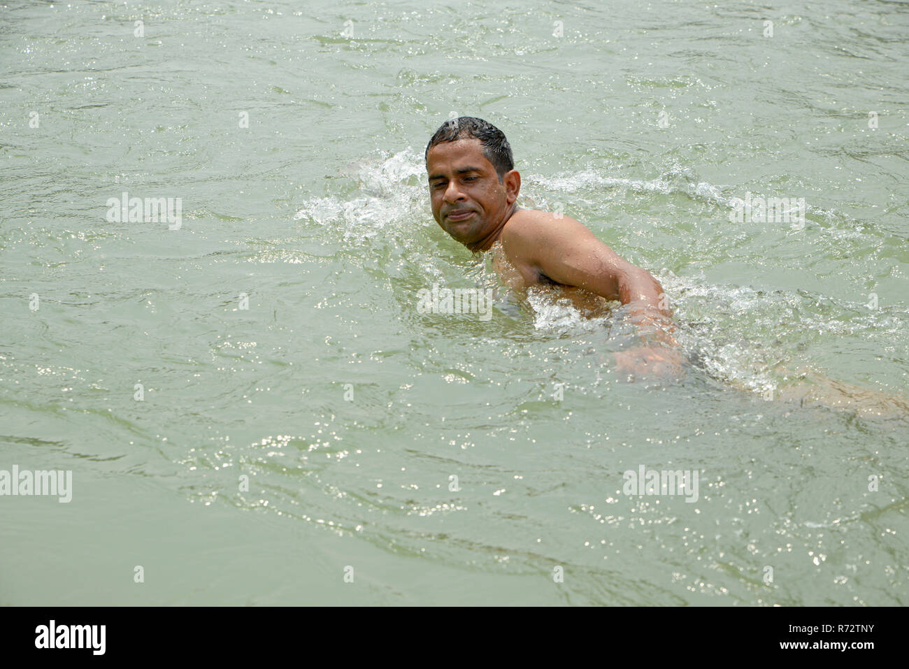 Indian boys playing in water hi-res stock photography and images - Alamy