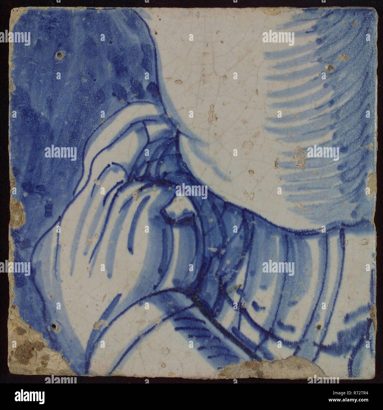 Tile with blue drawing (part of body with arm?), tile picture footage ...