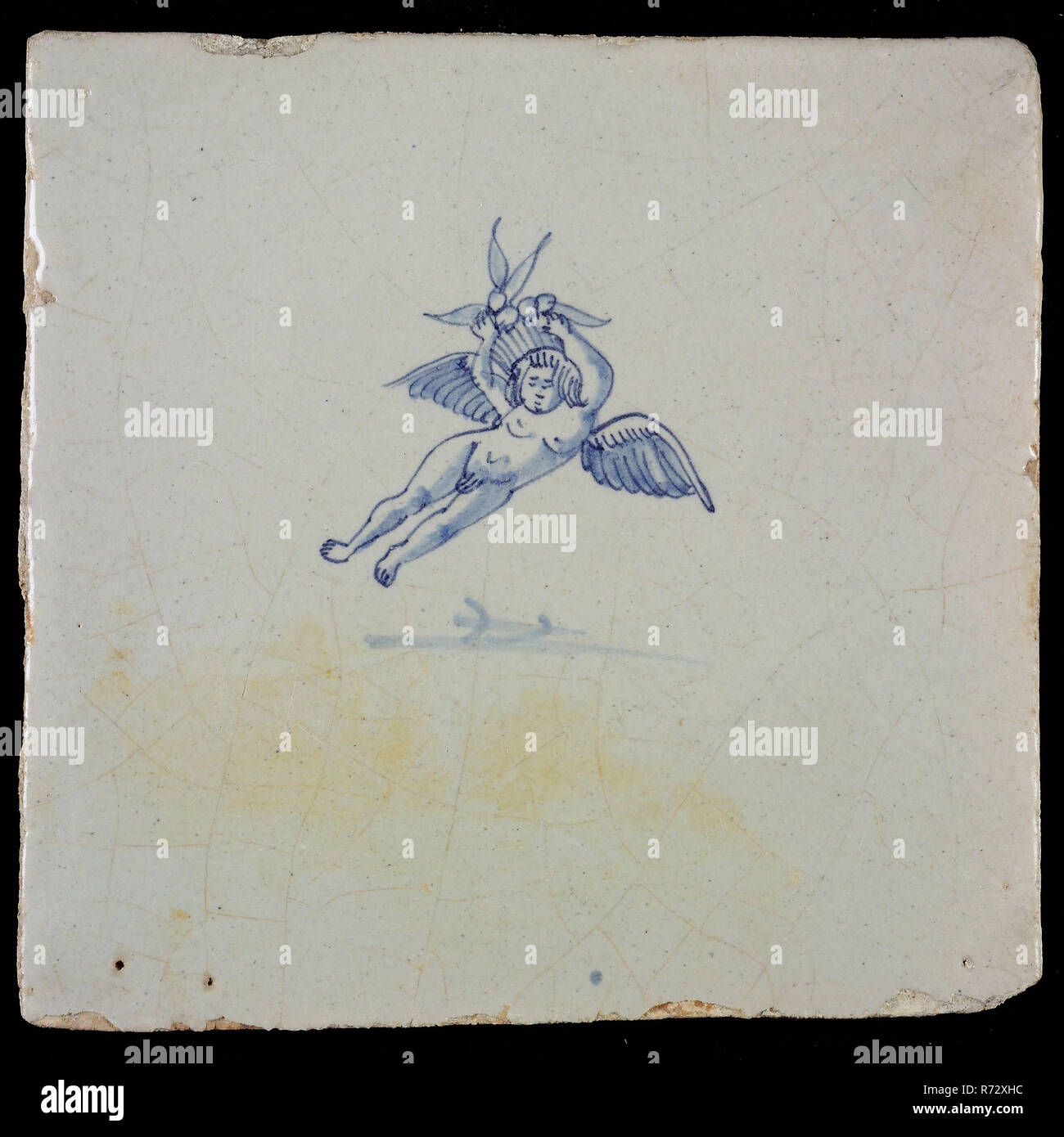 White tile with blue flying putto, wall tile tile sculpture ceramic ...