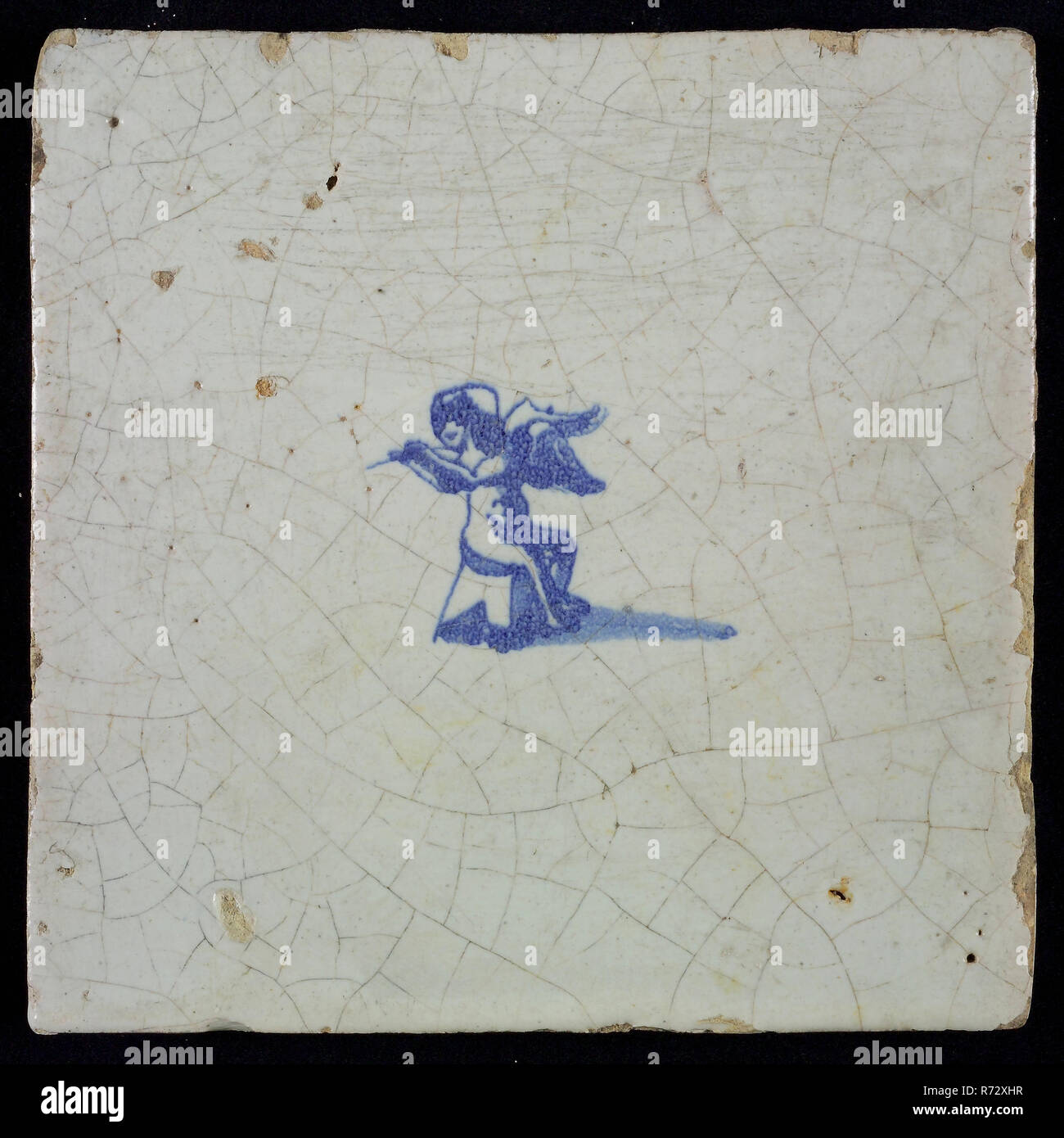 White tile with blue putto, wall tile tile sculpture ceramic ...