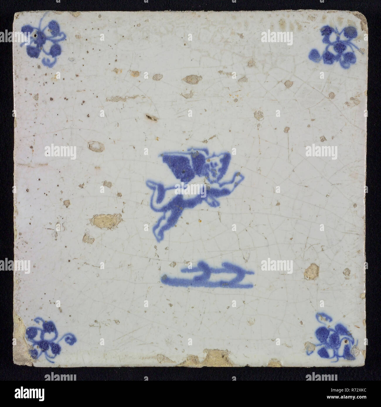 White tile with blue flying putto; corner motif spider, wall tile tile ...