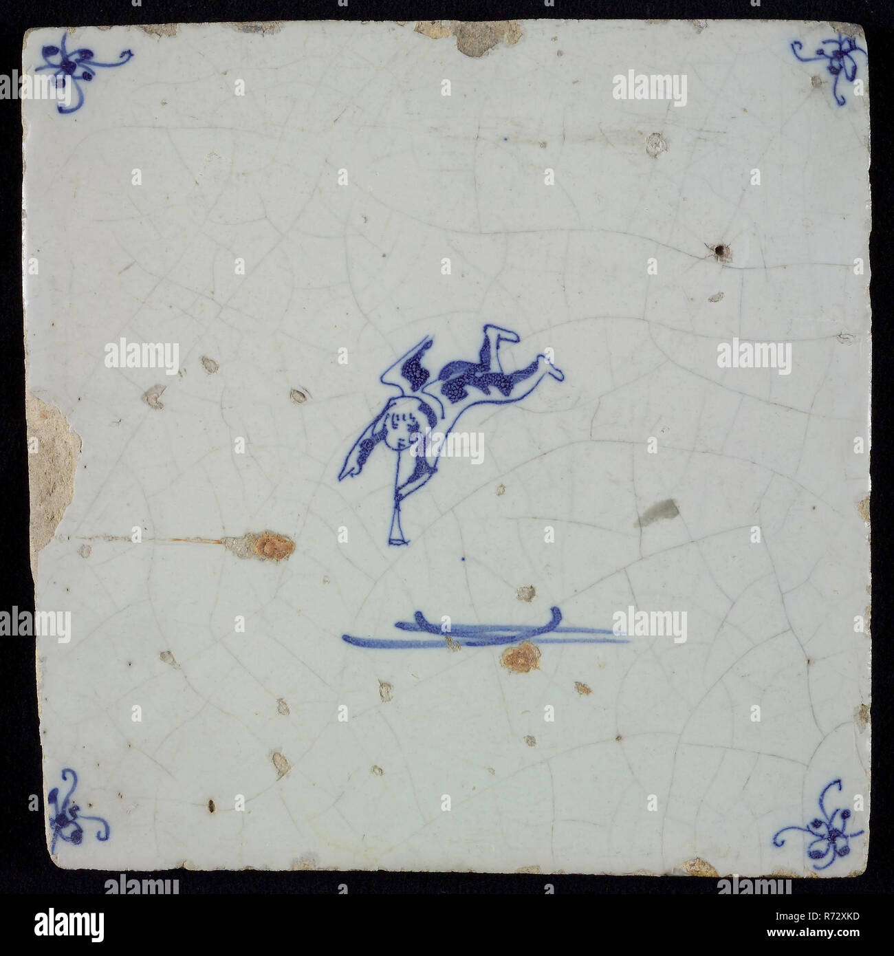 White tile with blue flying putto with wind instrument; corner motif ...