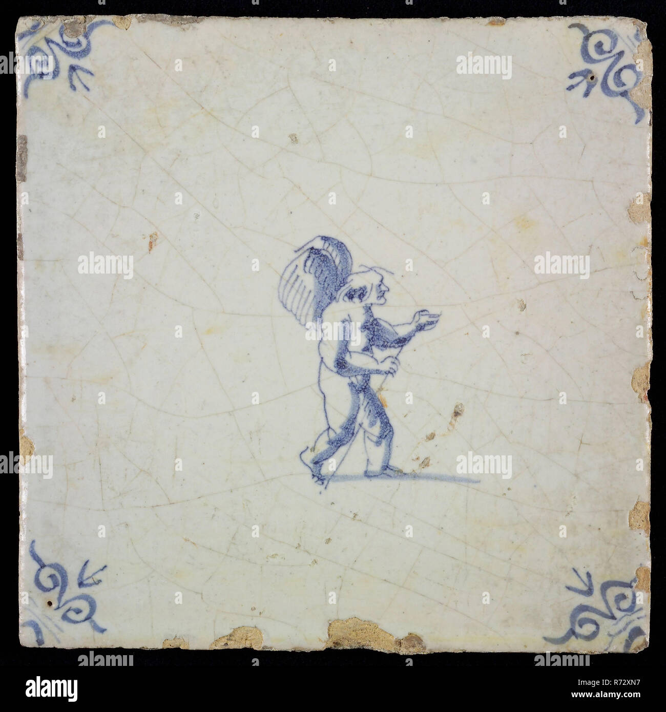 White tile with blue putto; corner pattern ox head, wall tile tile ...