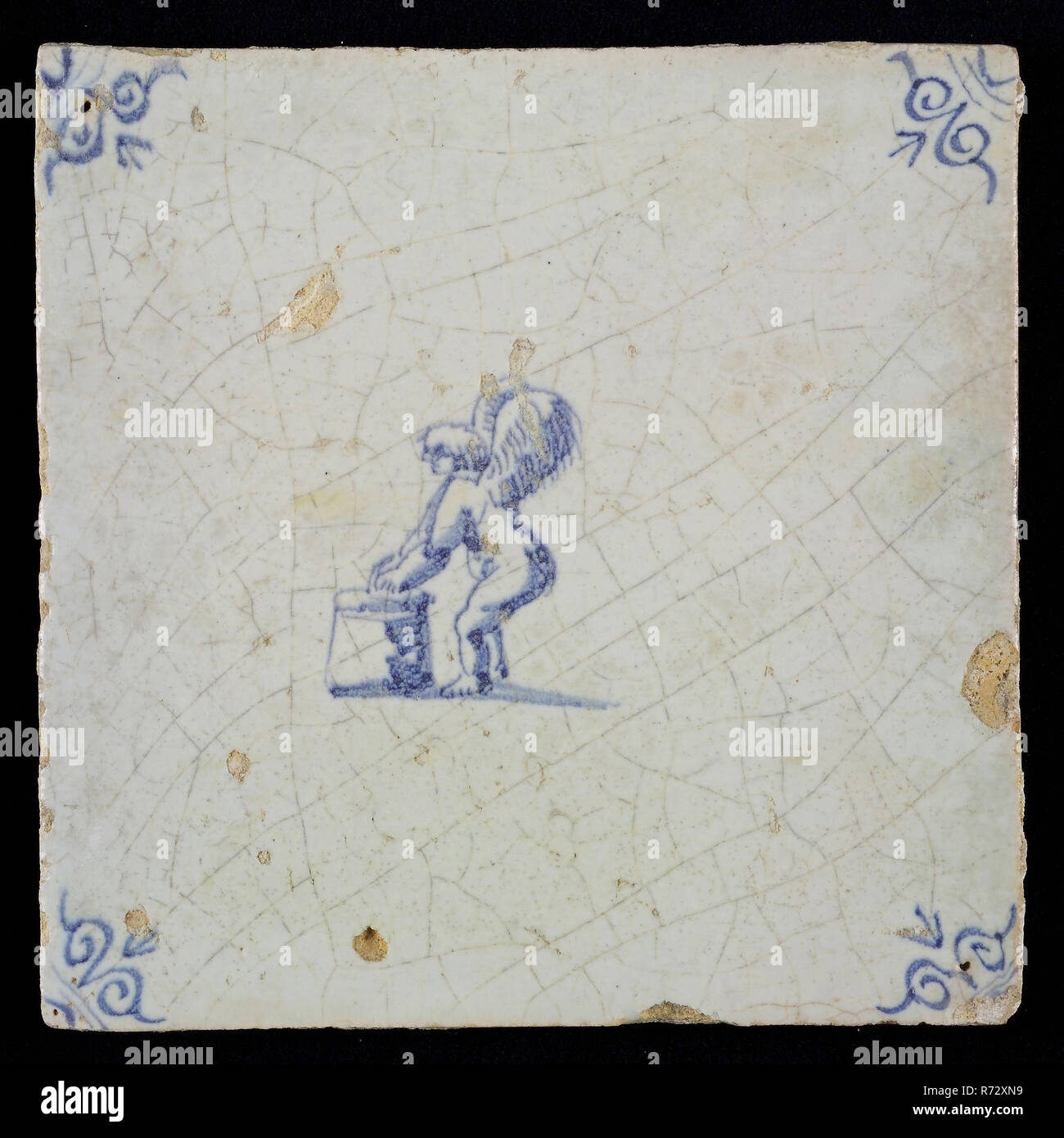 White tile with blue putto; corner pattern ox head, wall tile tile ...