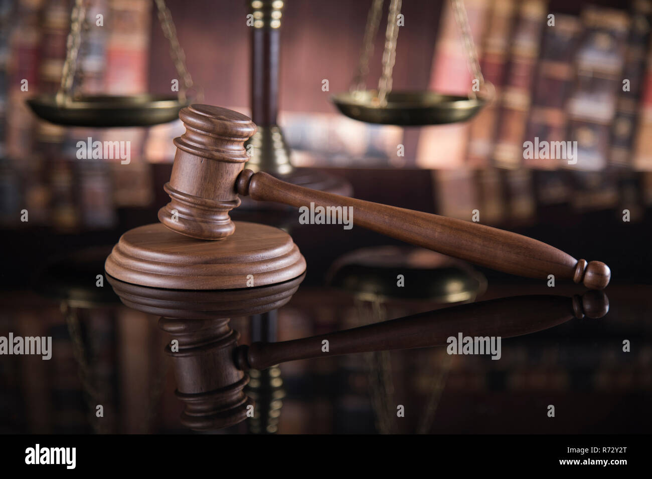 Law theme, mallet of the judge, justice scale, mirror reflection ...