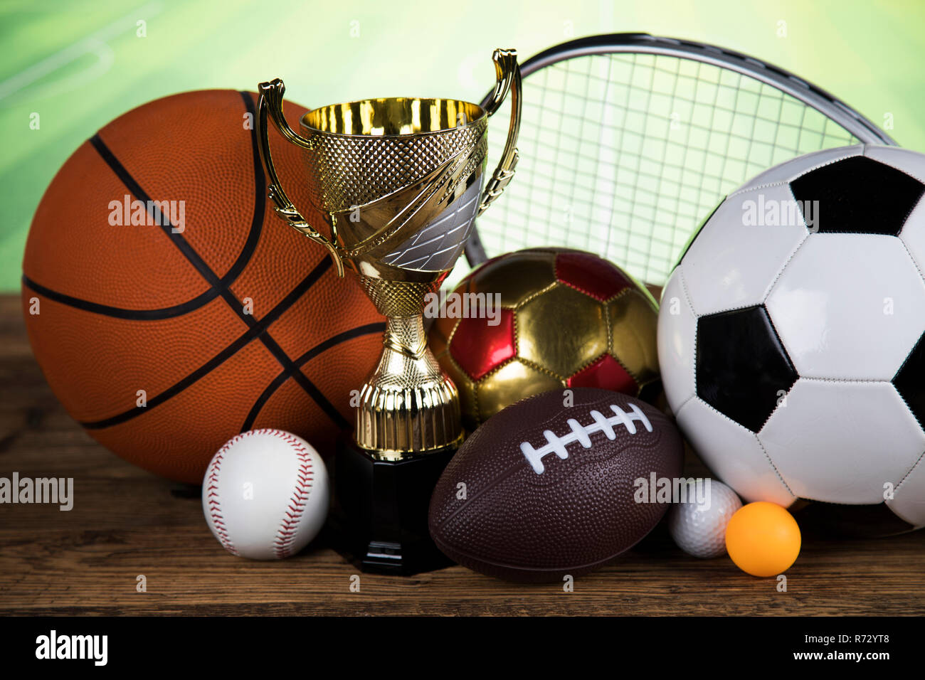 Winner trophy, Sport equipment and balls Stock Photo - Alamy