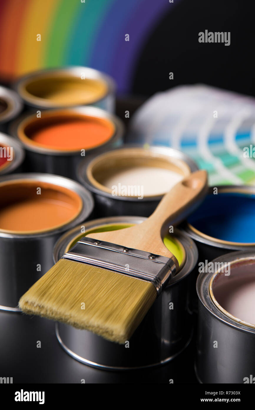 Tin cans with paint and brushes Stock Photo - Alamy