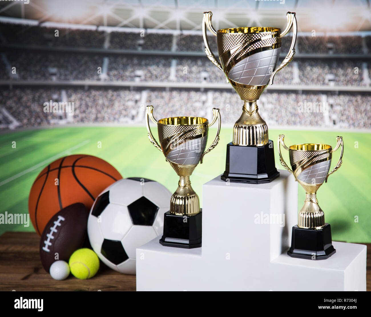 Sport podium, Cups of winners award Stock Photo - Alamy